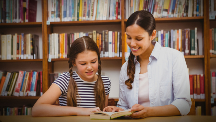 Volunteer Reading Tutors Boost Students' Literacy Skills - Giving Compass